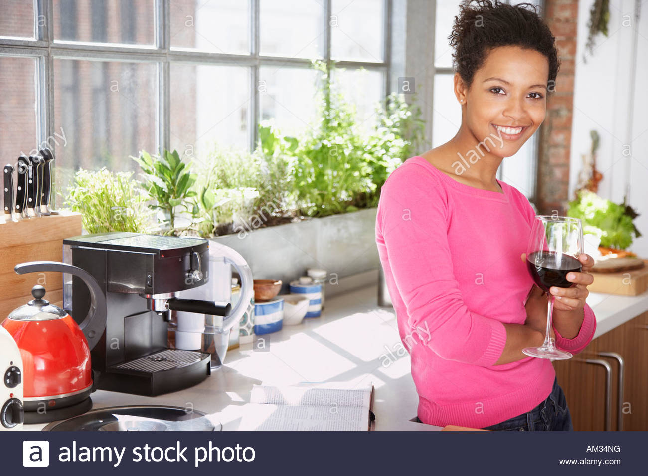 Leaning On Counter Stock Photos & Leaning On Counter Stock Images - Alamy