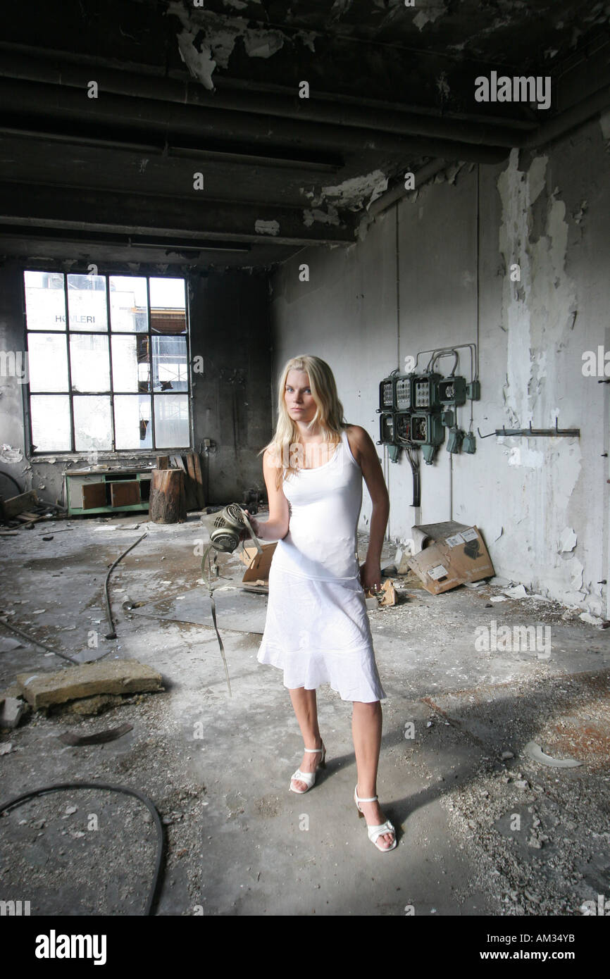 girl throw face mas inside old building Stock Photo - Alamy