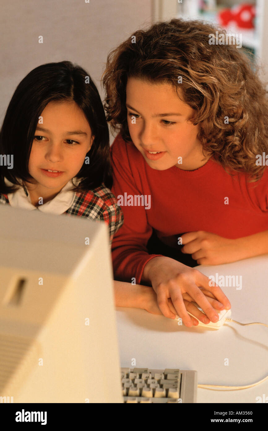Schoolgirls at computer Stock Photo - Alamy