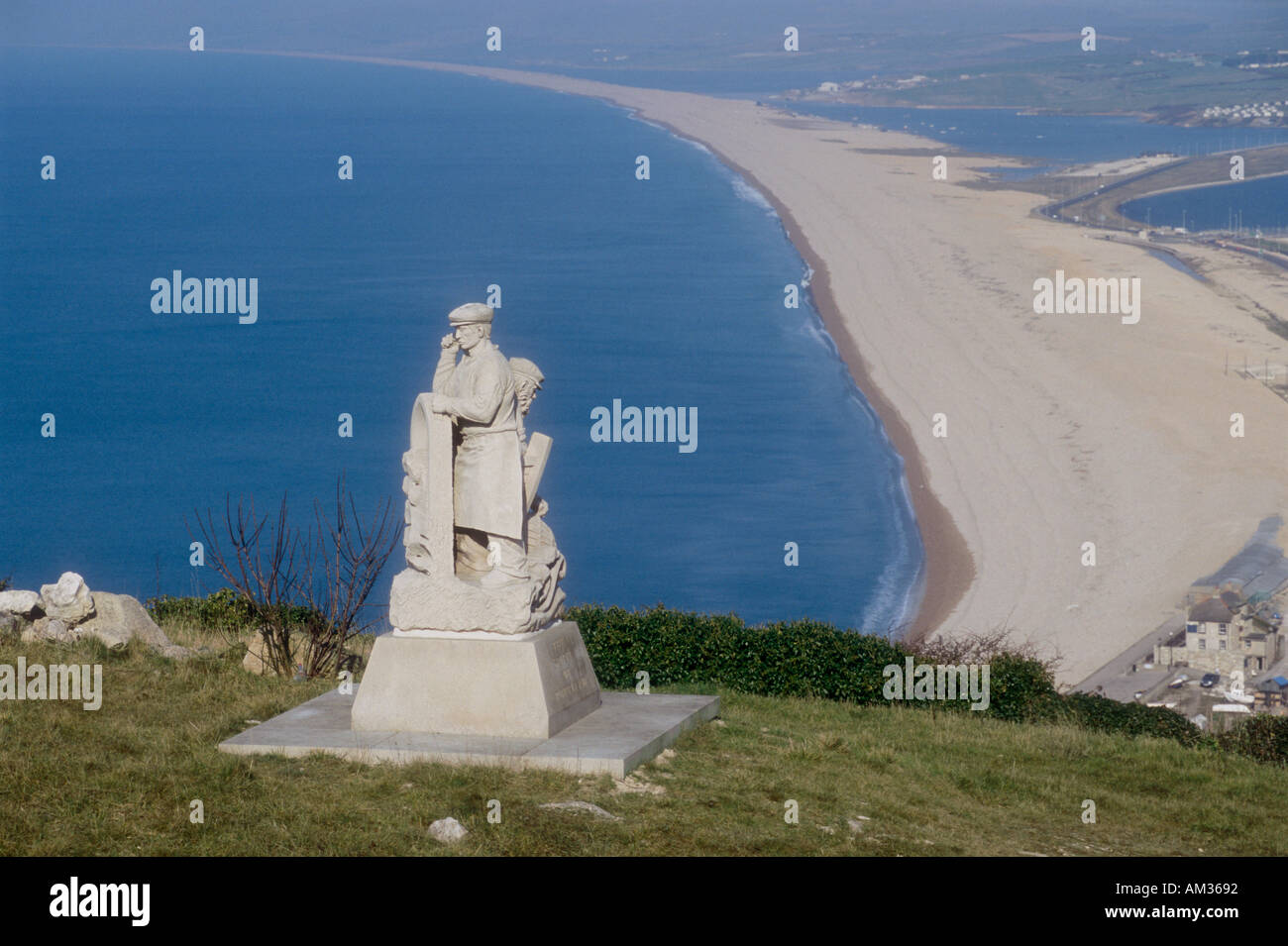 The Spirit of Portland stone sculpture and Chesil Beach from the Isle ...