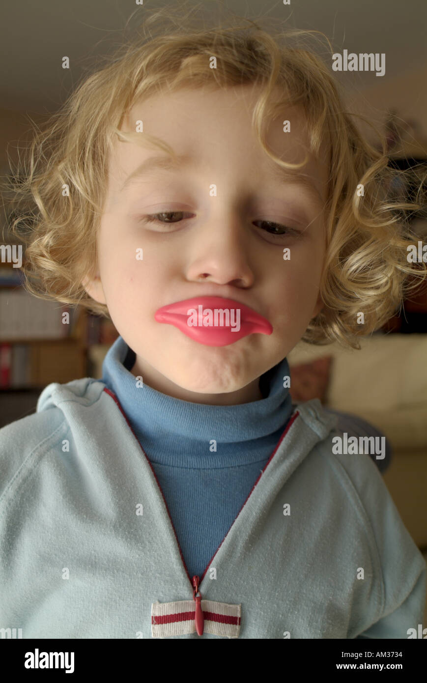 Portrait Of A Young Girl Making Faces With Funny Plastic Lips Stock ...