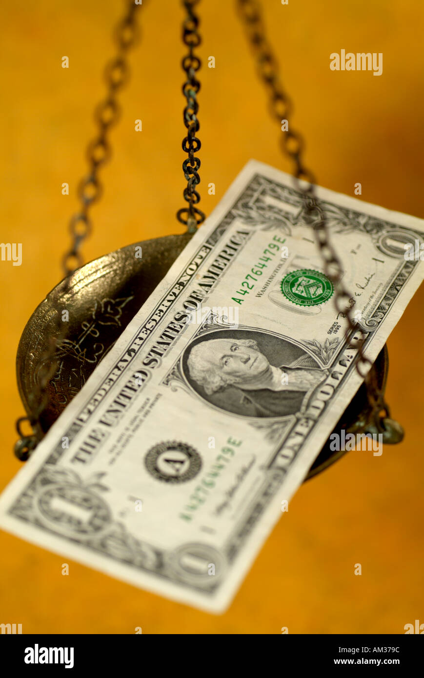 Euro of bank notes and dollar on scales hi-res stock photography and ...