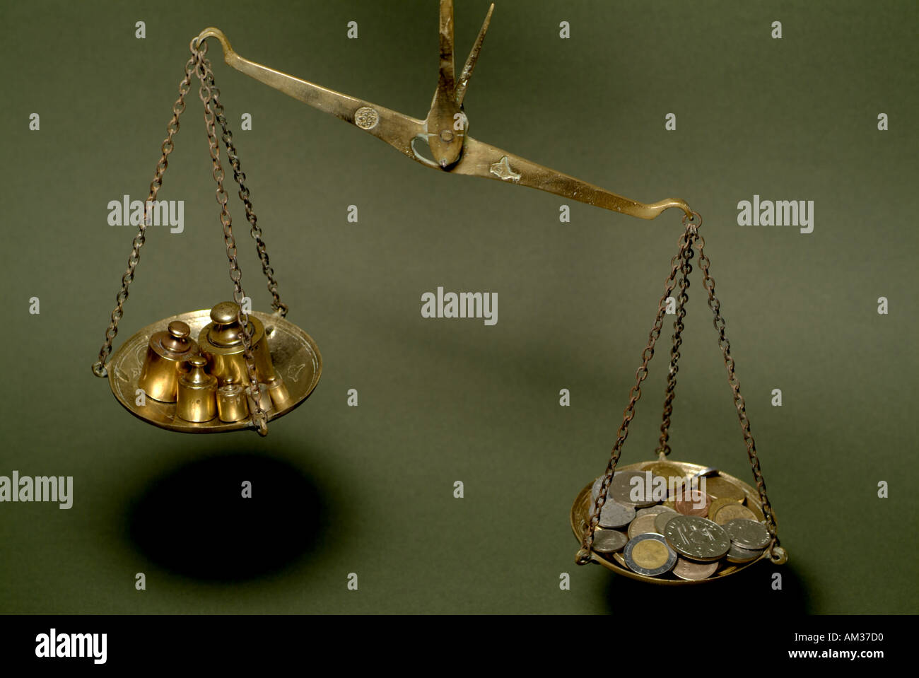 French copper weights on a scale Stock Photo - Alamy