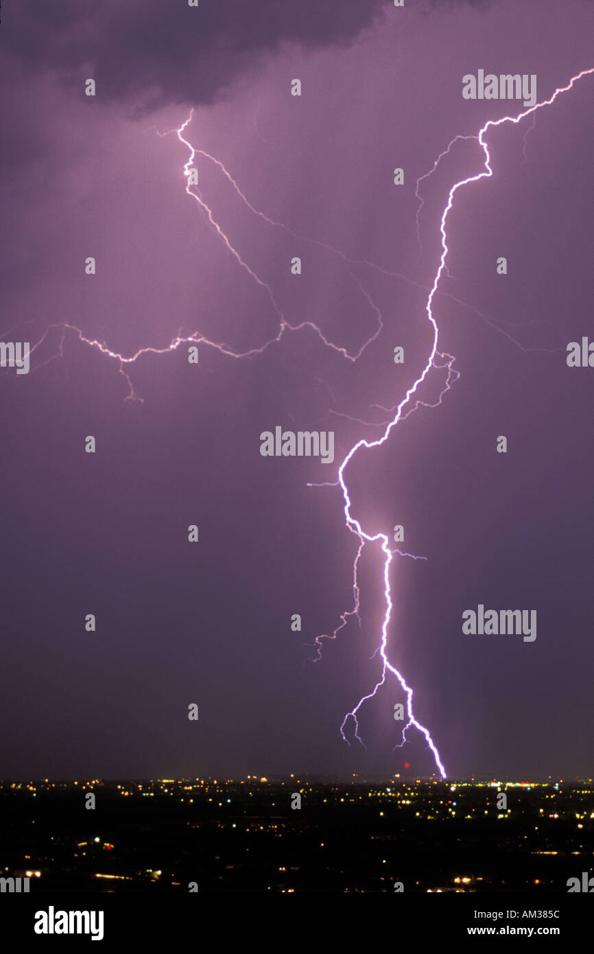 Lightning strike over the city of Tucson Arizona vertical Stock Photo ...