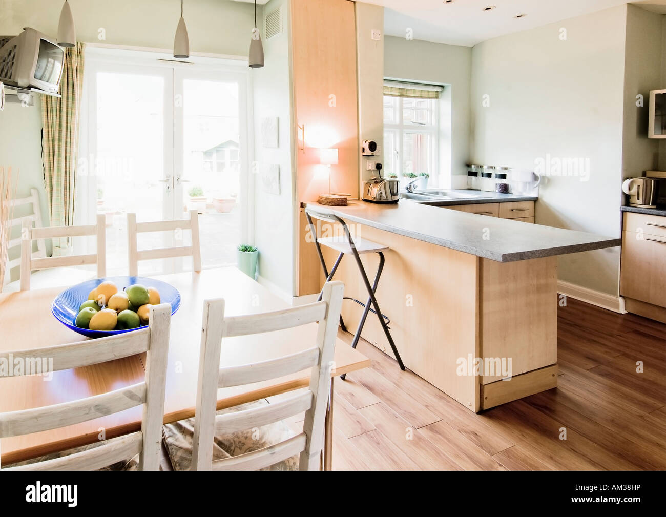 kitchen with appliances and table tops Stock Photo - Alamy