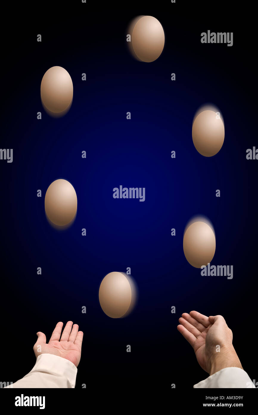 Circus juggling with six eggs Stock Photo - Alamy