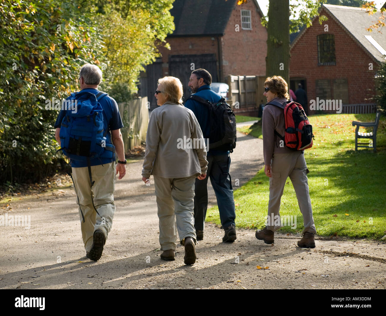 group of middle aged walkers on footpath walking back to car Stock ...