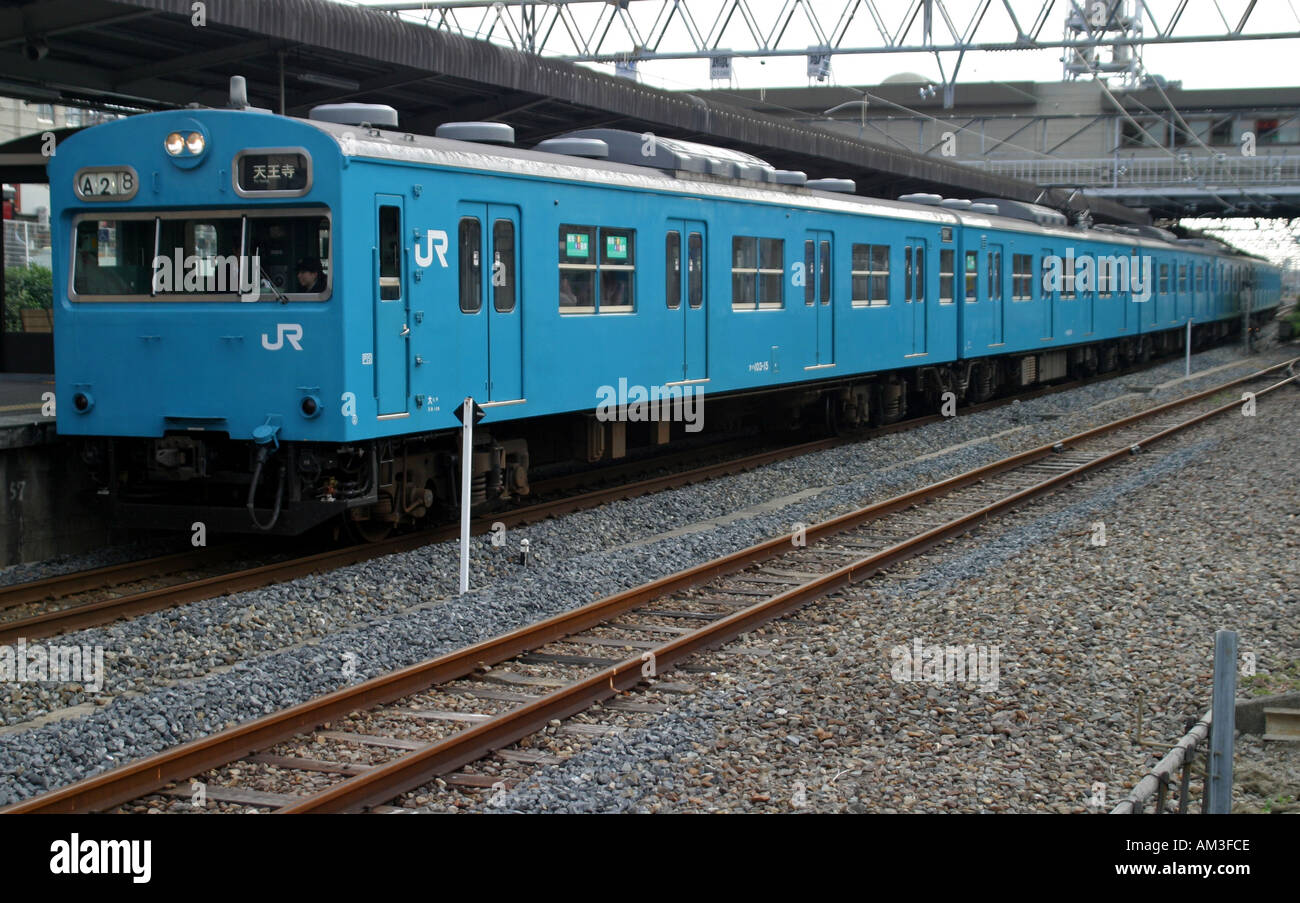 An efficient and on time Japan Railways local train arriving at a ...