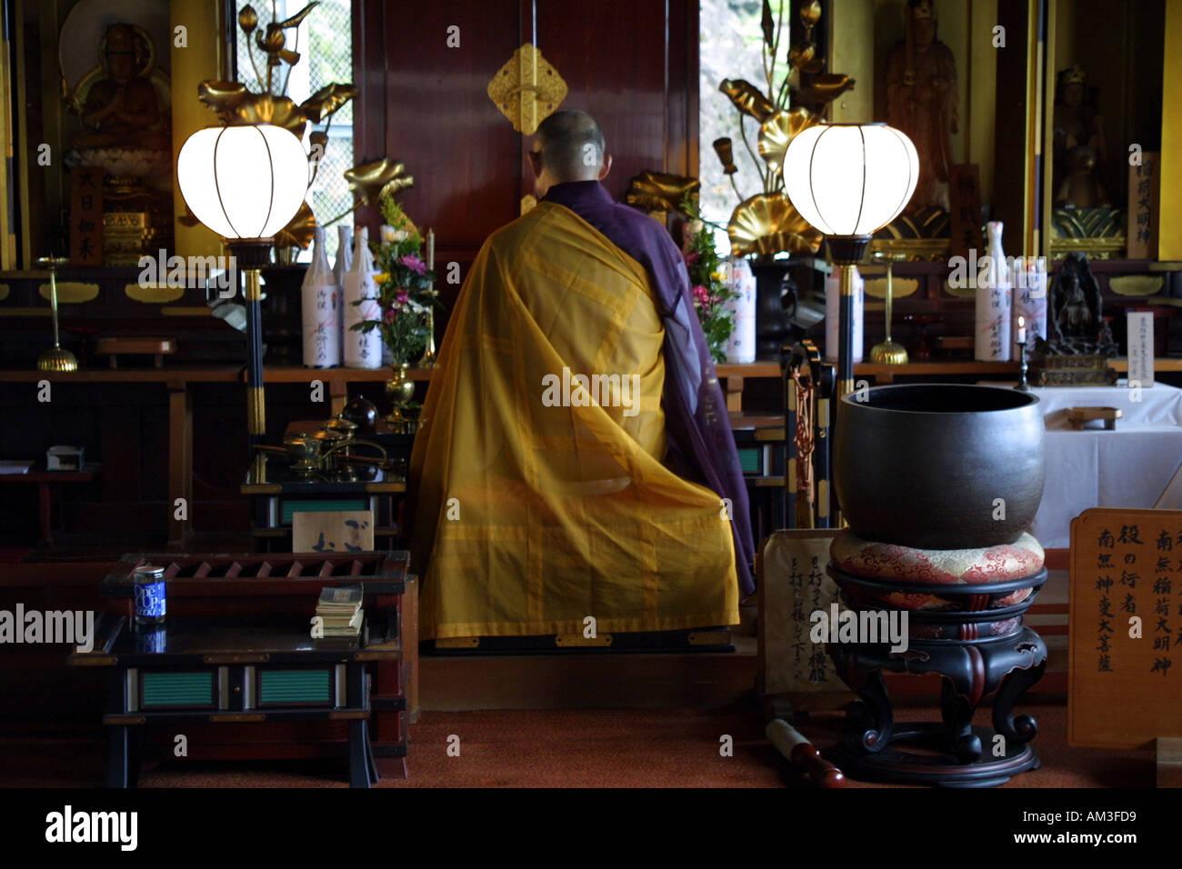 Iconic traditional serene old Japanese buddhist preist monk praying in ...