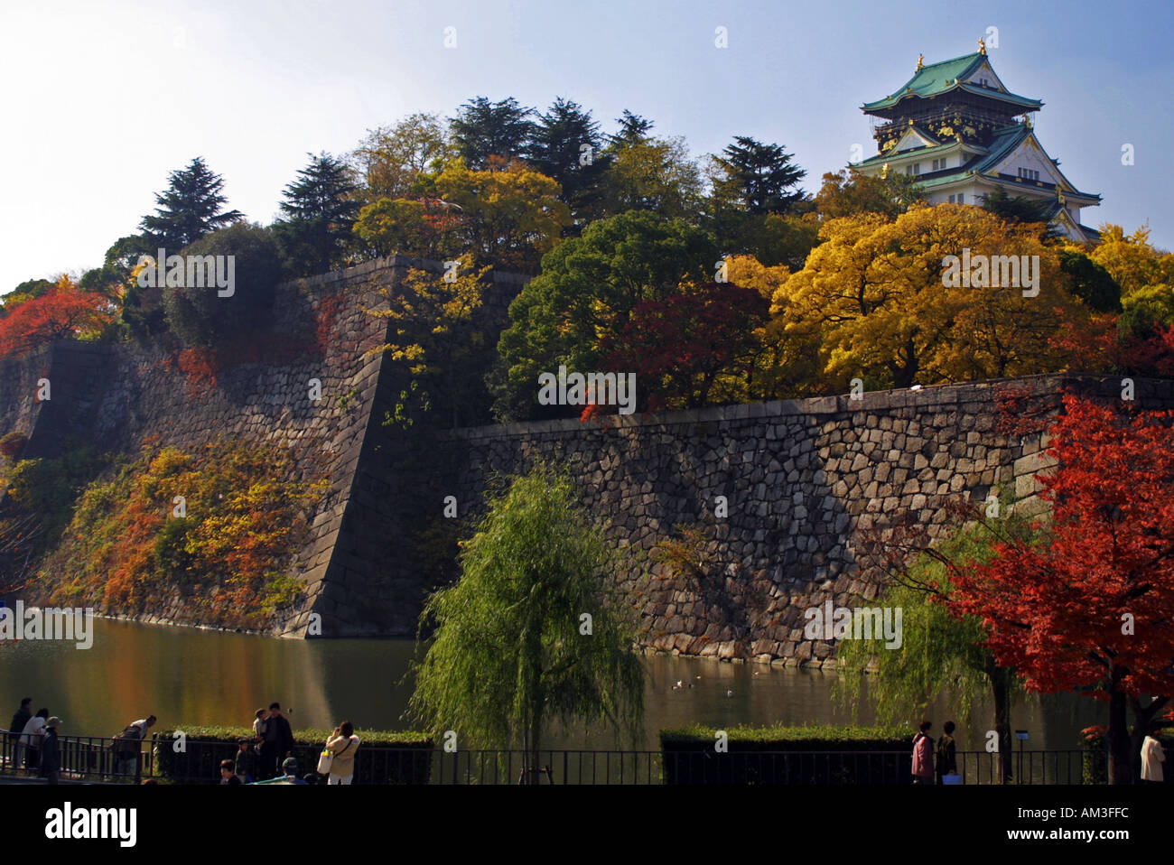 Famous Osaka Jo Castle surrounded with Autumn fall colours in Osaka ...