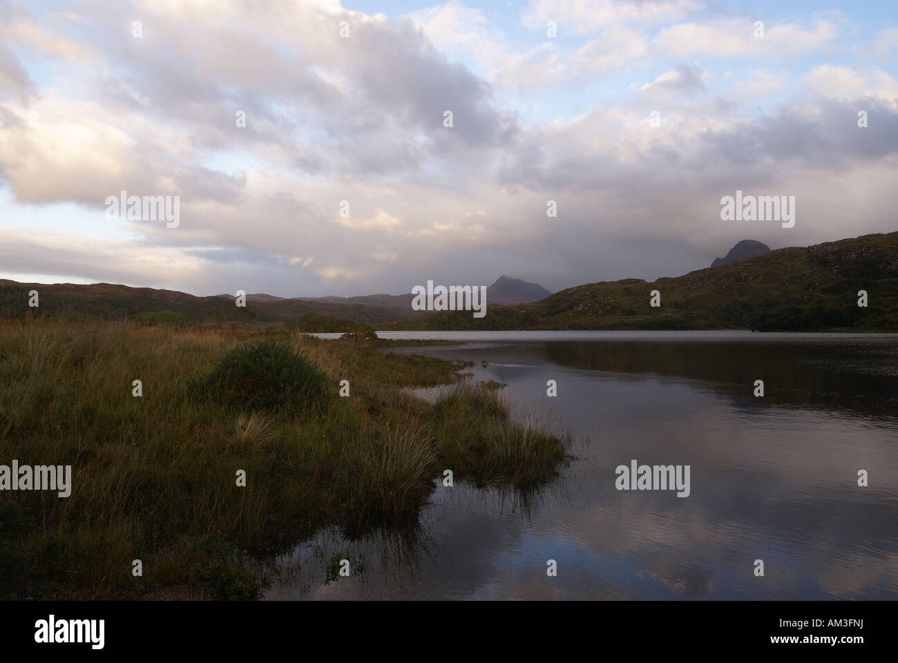 Evening light at Loch Druim in Sutherland, Scotland looking towards ...