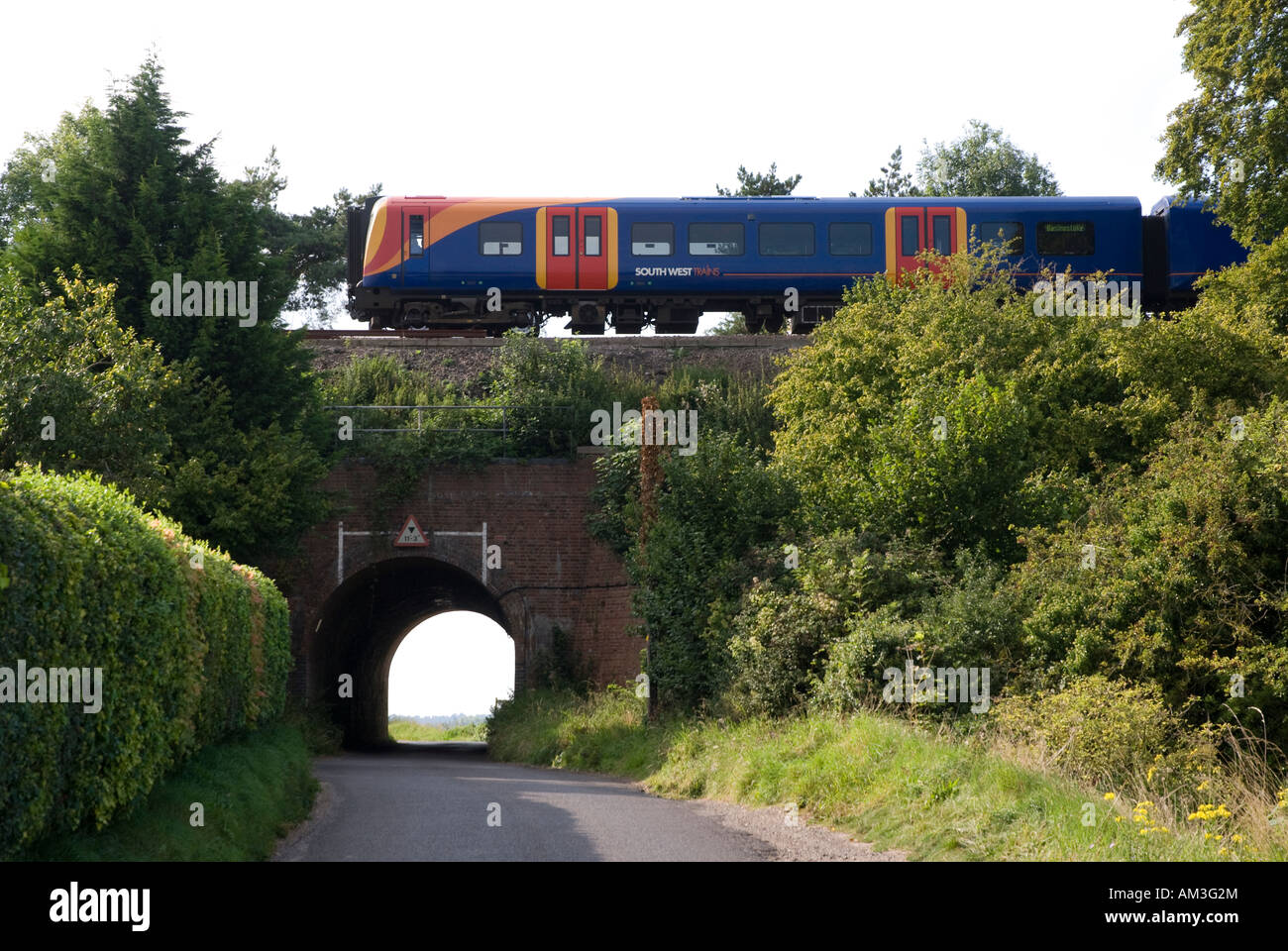 train over railway bridge Stock Photo - Alamy