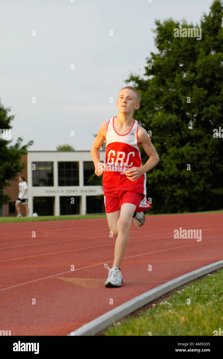 Teenage boy runner at a high school track and field district meet Stock ...