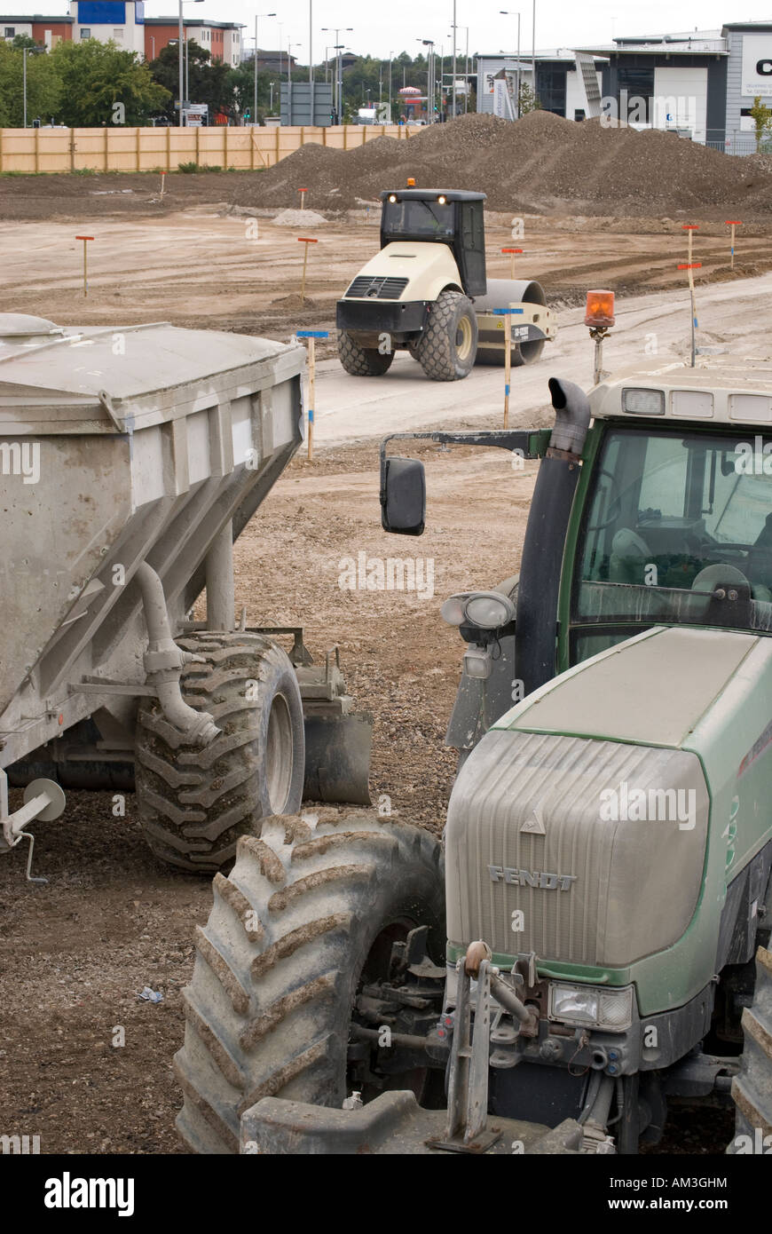 Heavy earth moving machinery on building site Stock Photo - Alamy