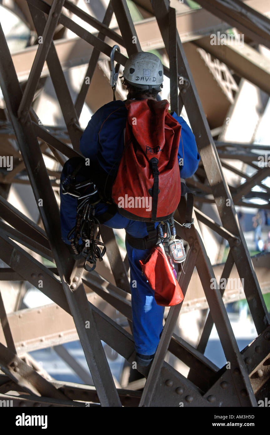 Construction workers on the Eiffel Tower Paris France Stock Photo - Alamy