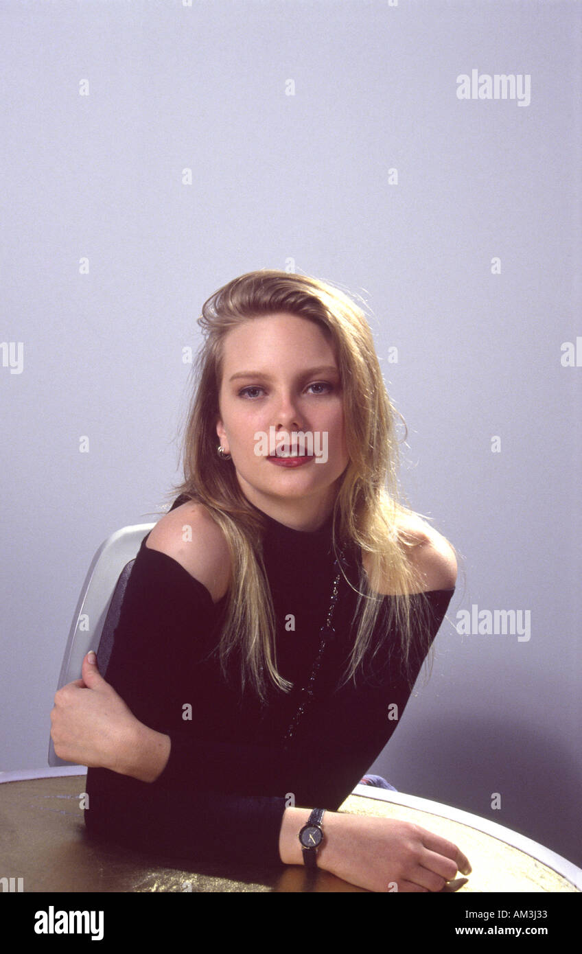 Seated female model hi-res stock photography and images - Alamy