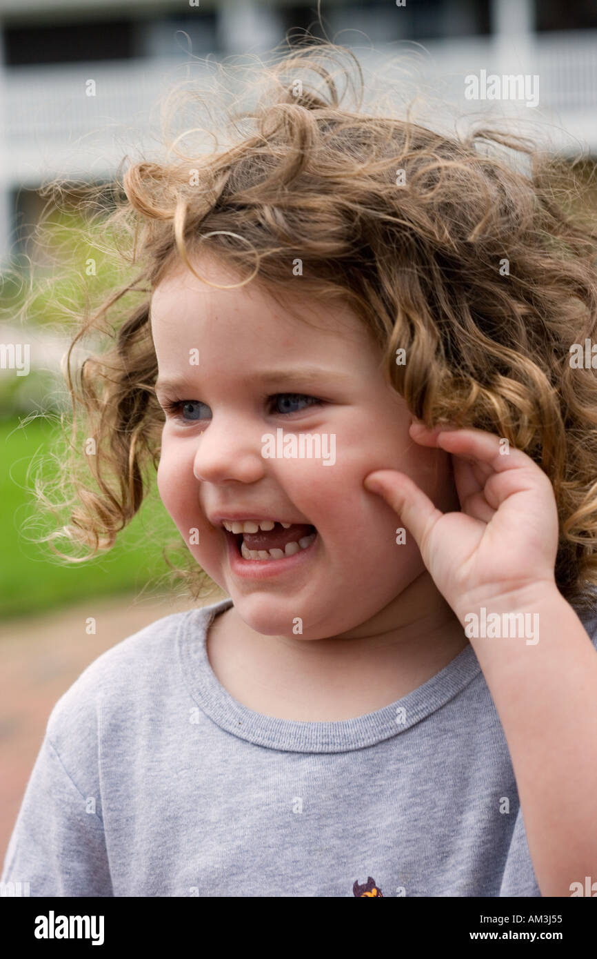 Pinching cheek hi-res stock photography and images - Alamy