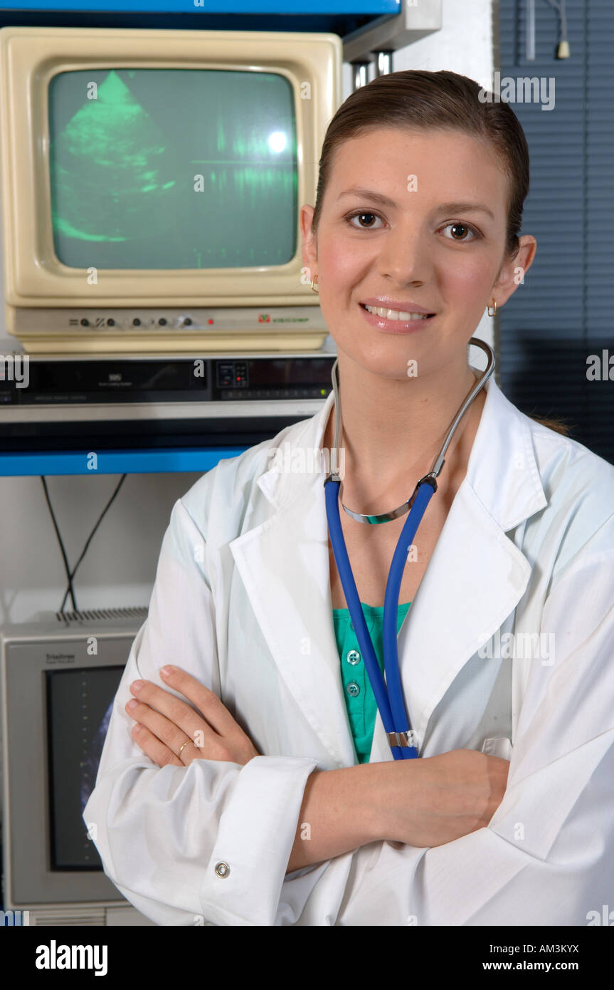Portrait of female doctor with medical equipment on back Stock Photo ...