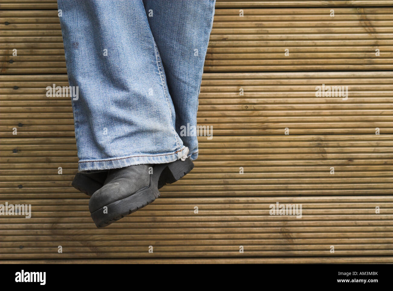 Legs hanging boots hi-res stock photography and images - Alamy