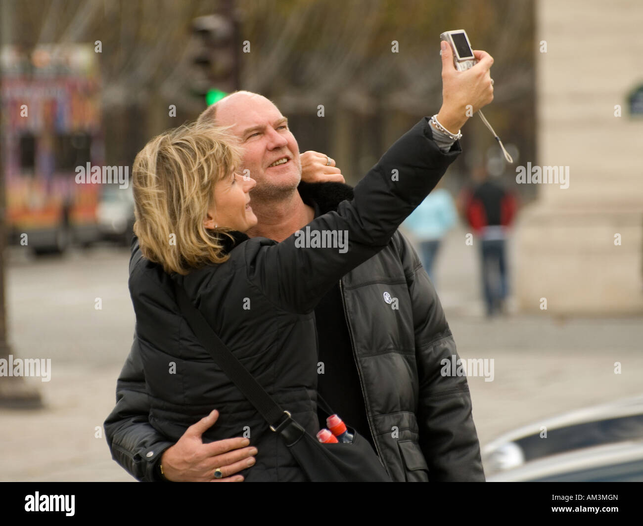 Colourful couple photographing hi-res stock photography and images - Alamy