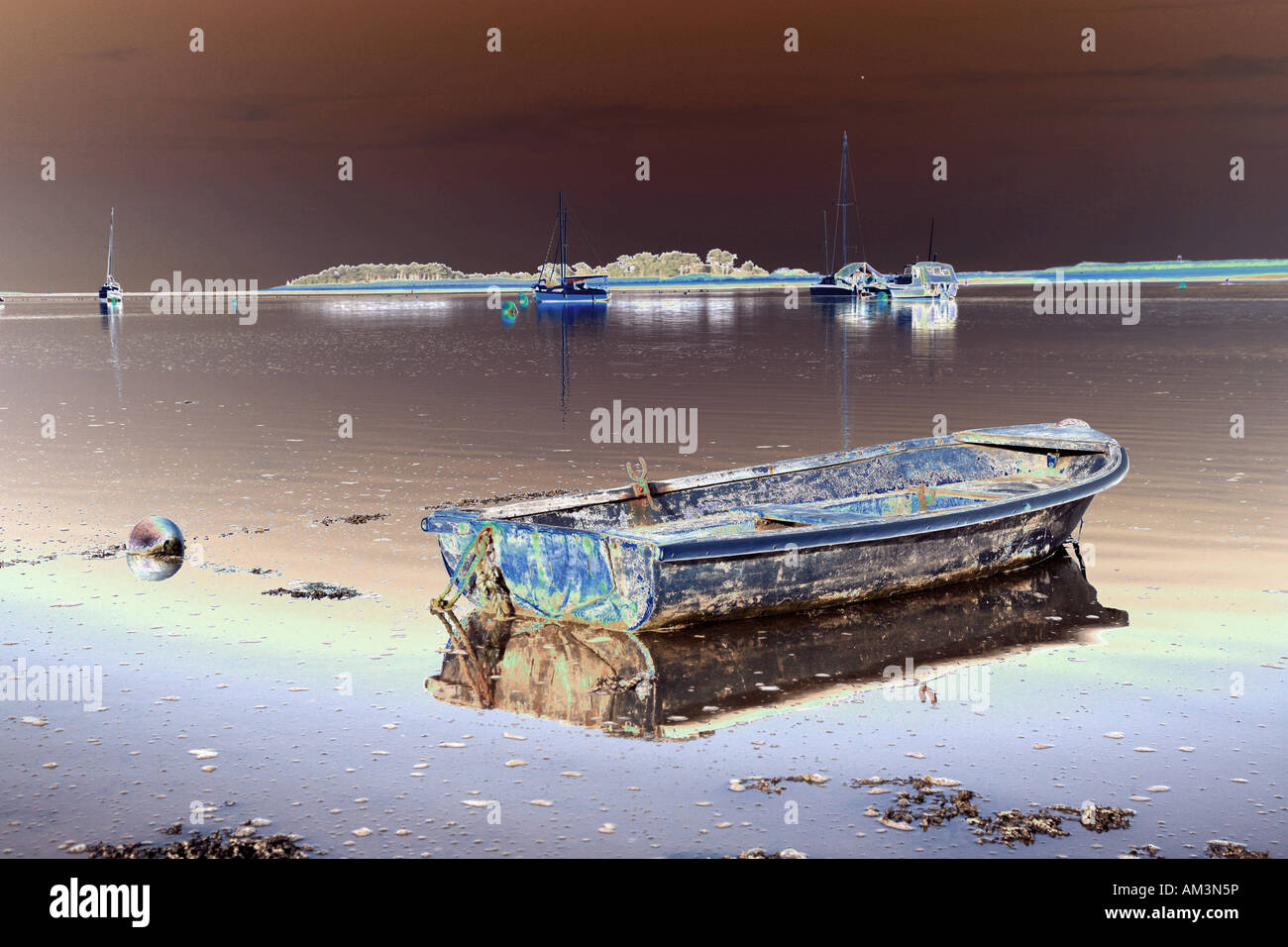 Boat in Still Water. Wells-next-the-Sea, Norfolk Stock Photo - Alamy