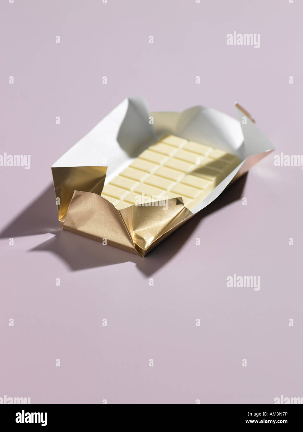 chocolate bar opened in wrapper Stock Photo - Alamy