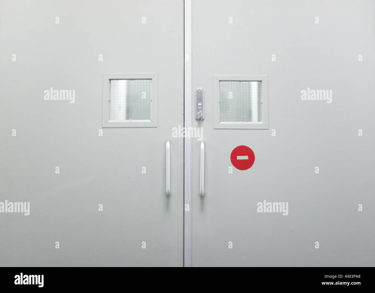 White double door with windows and No Entry sign on it Stock Photo - Alamy