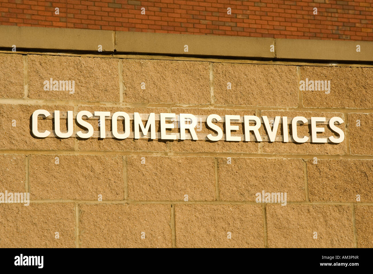 customer services sign on building Stock Photo - Alamy