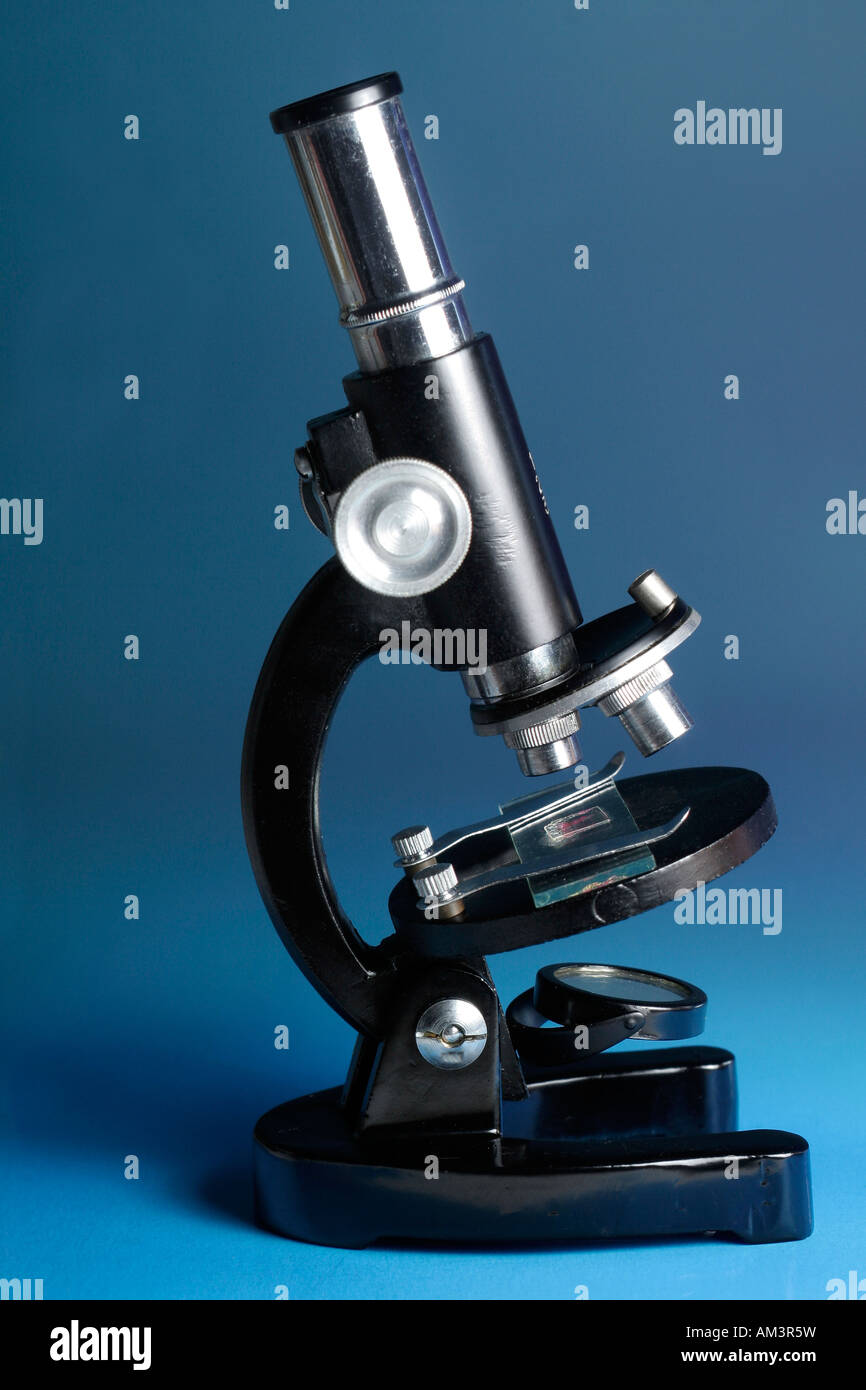 Small old style optical microscope iconic of SCIENCE Stock Photo - Alamy