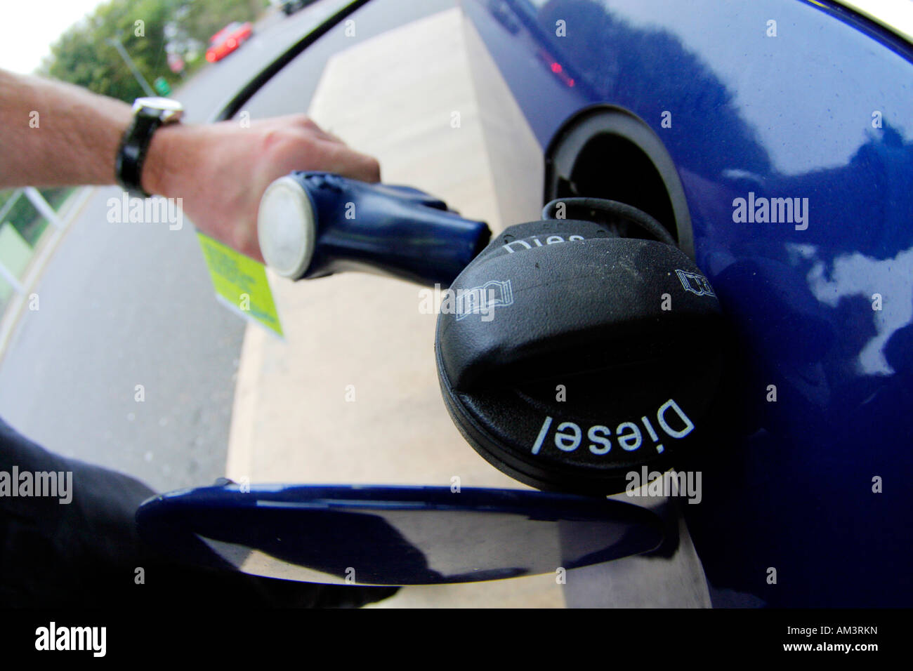 Filling a car with diesel fuel at filling station Stock Photo - Alamy