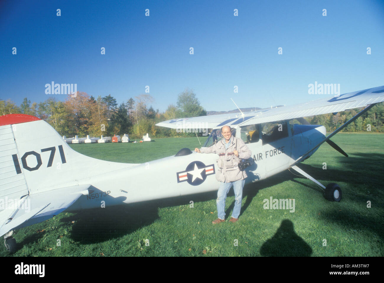 Photographer Joe Sohm posing in front New England before an aerial ...