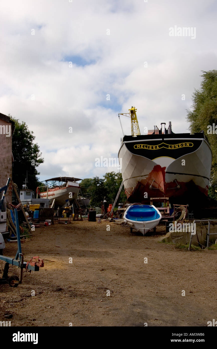 Steel Thames sailing barge Melissa undergoing restoration at a boatyard ...
