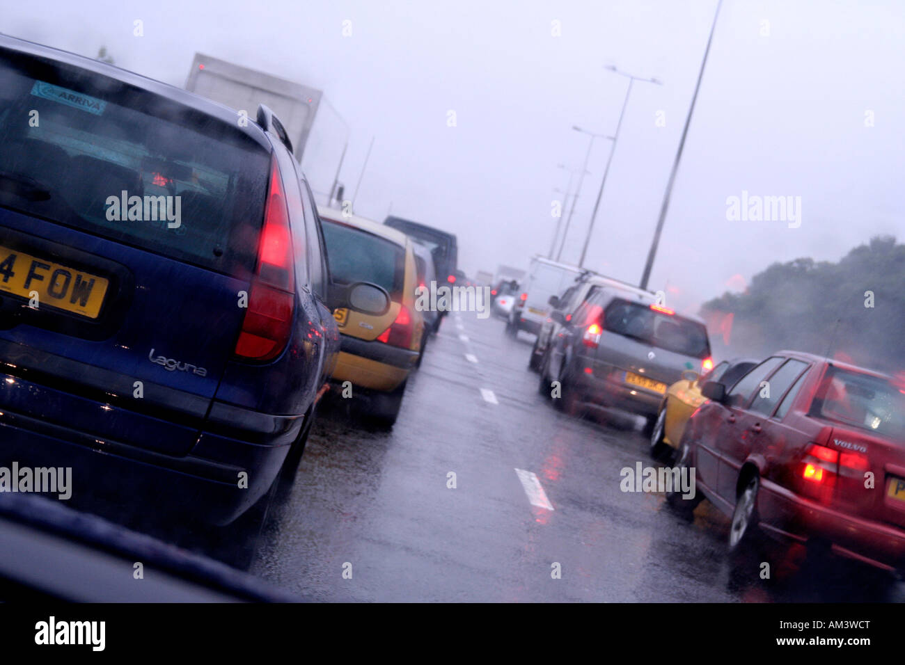 Traffic stuck on motorway during heavy rain in July 2007 UK Stock Photo ...