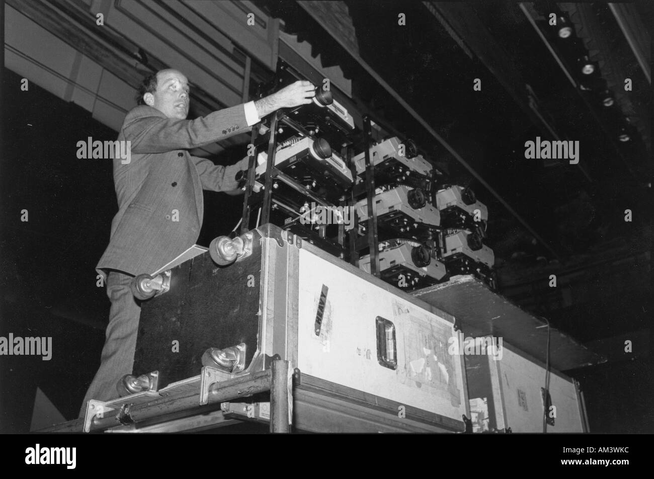 Joe Sohm adjusting lenses of multi image show for Presidential ...