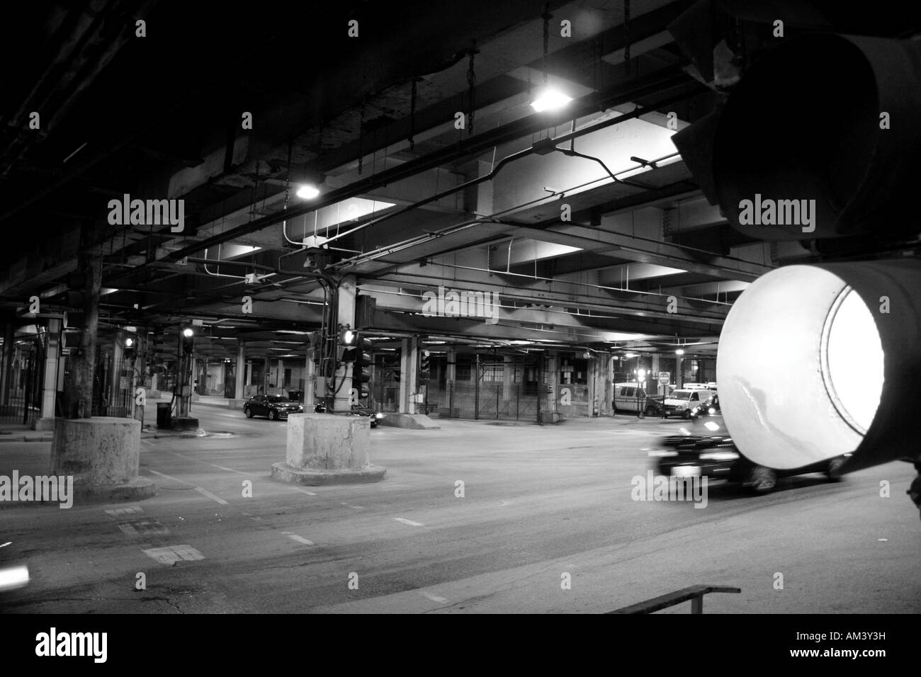 Road junction under a bridge Stock Photo - Alamy