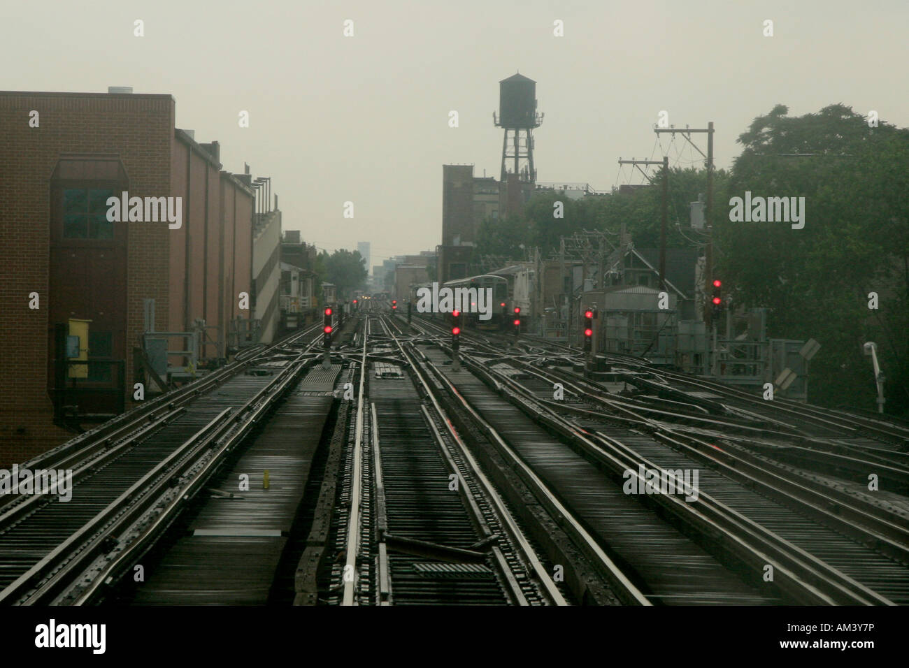 Tracks on the El on a hazy day with many red stop signals Stock Photo ...