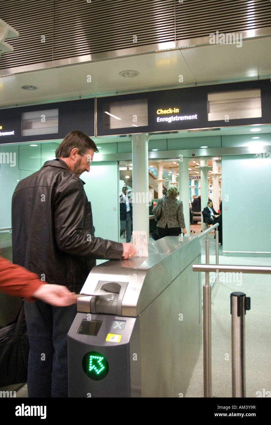 People check in at St Pancras International Eurostar railway station in ...