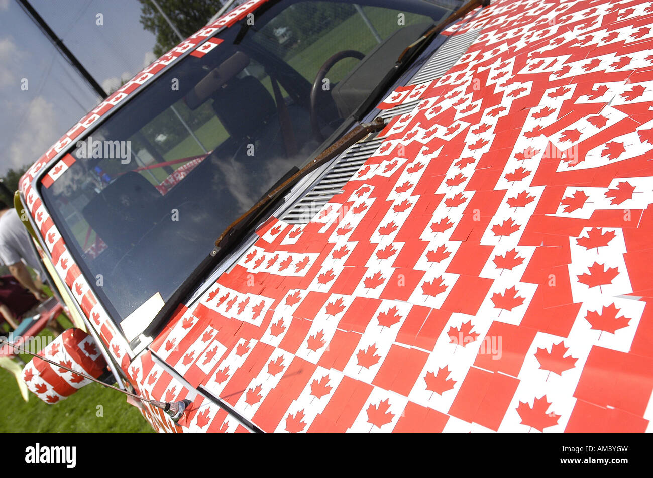 Car with canadian flags during canada day celebration montreal quebec ...
