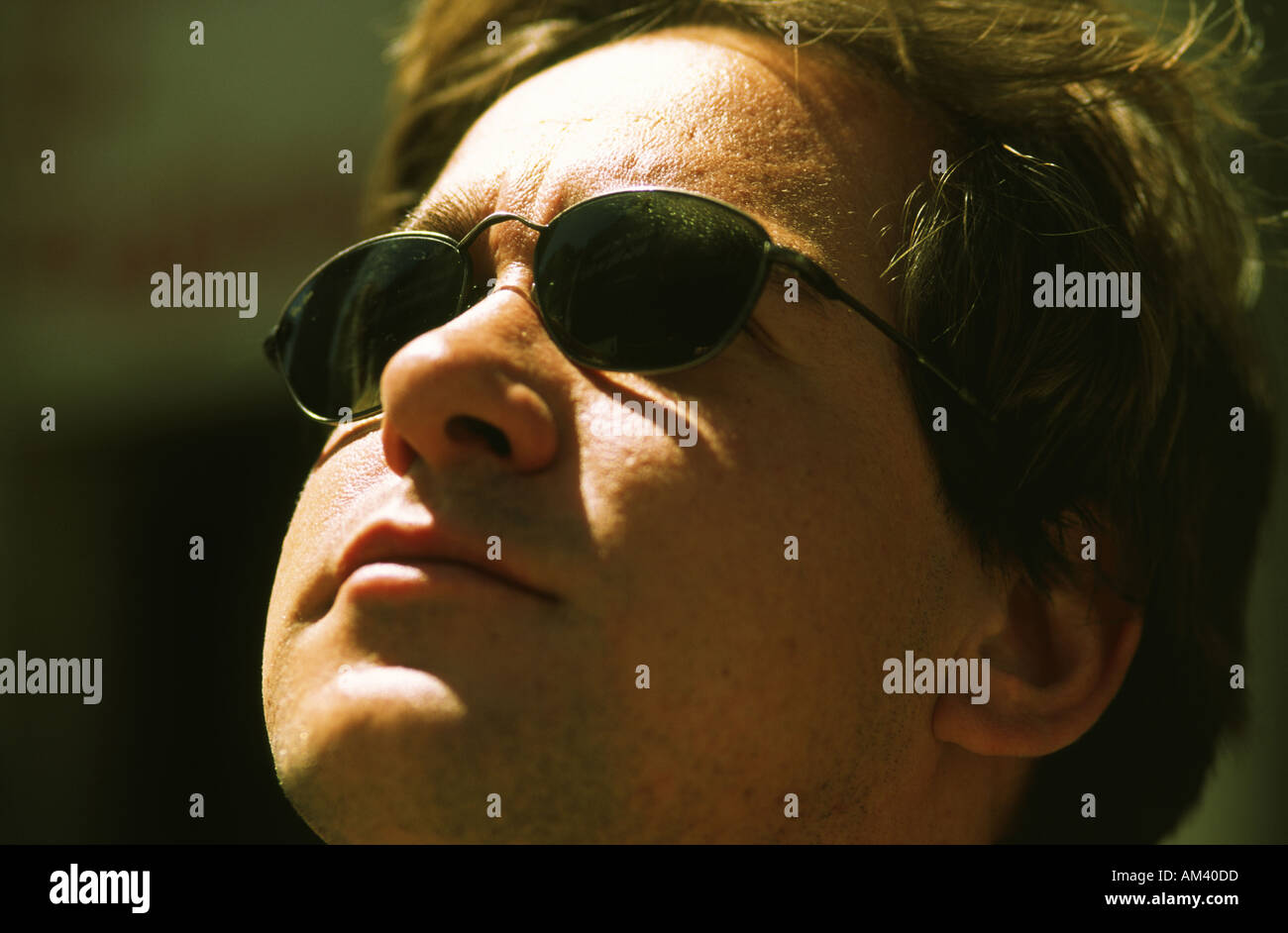 Taking the sun Stock Photo - Alamy