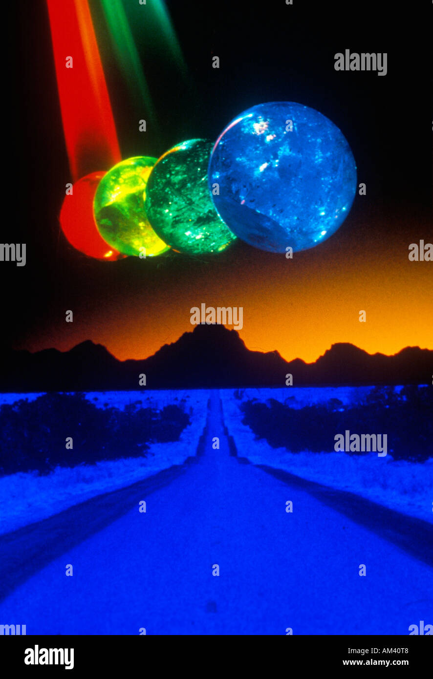 A blue and black horizon below several multi colored spheres appearing ...