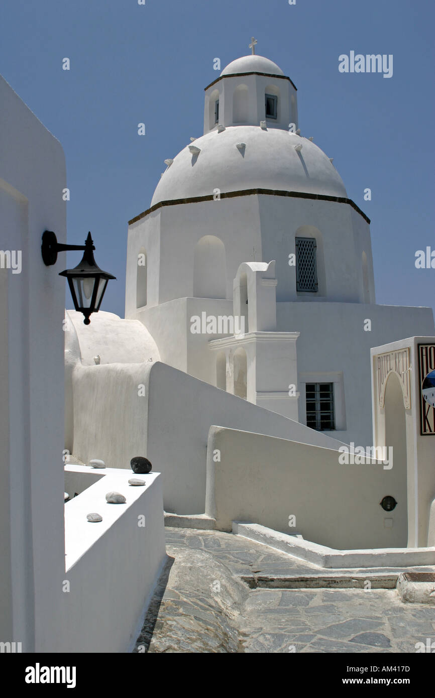 Typical ancient white domed church Fira town on the romantic exotic ...