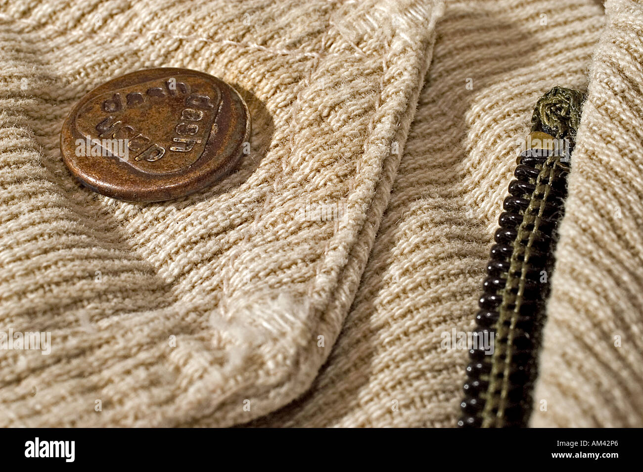 Fabric button attach hi-res stock photography and images - Alamy