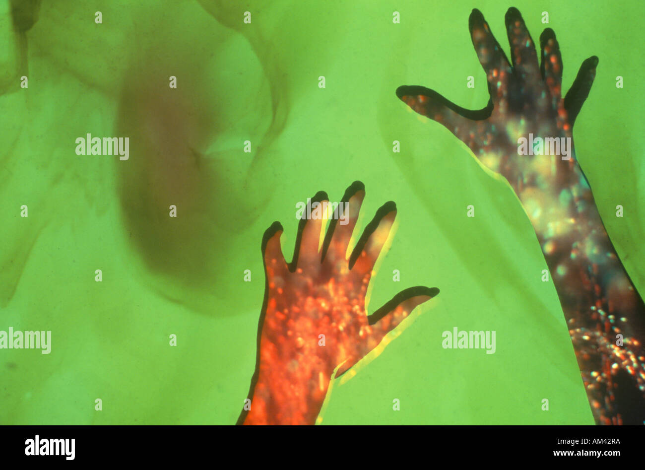 Special effects composite of posterized silhouette of two hands Stock ...