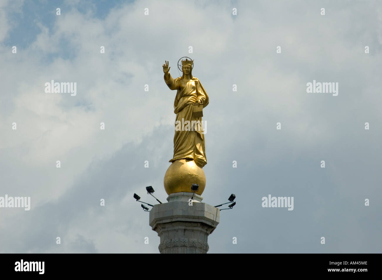 The Virgin Mary statue at the entrance to the port of Messina at ...
