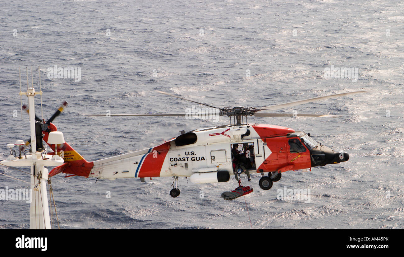 Rescue at sea with a coast guard helicopter Stock Photo - Alamy