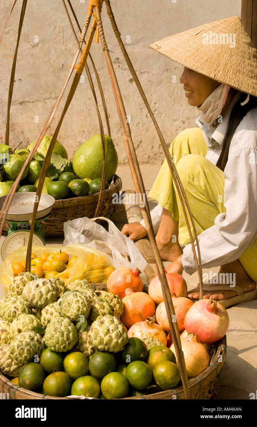 Produce vendor on street of Old Town in Hoi An Stock Photo - Alamy
