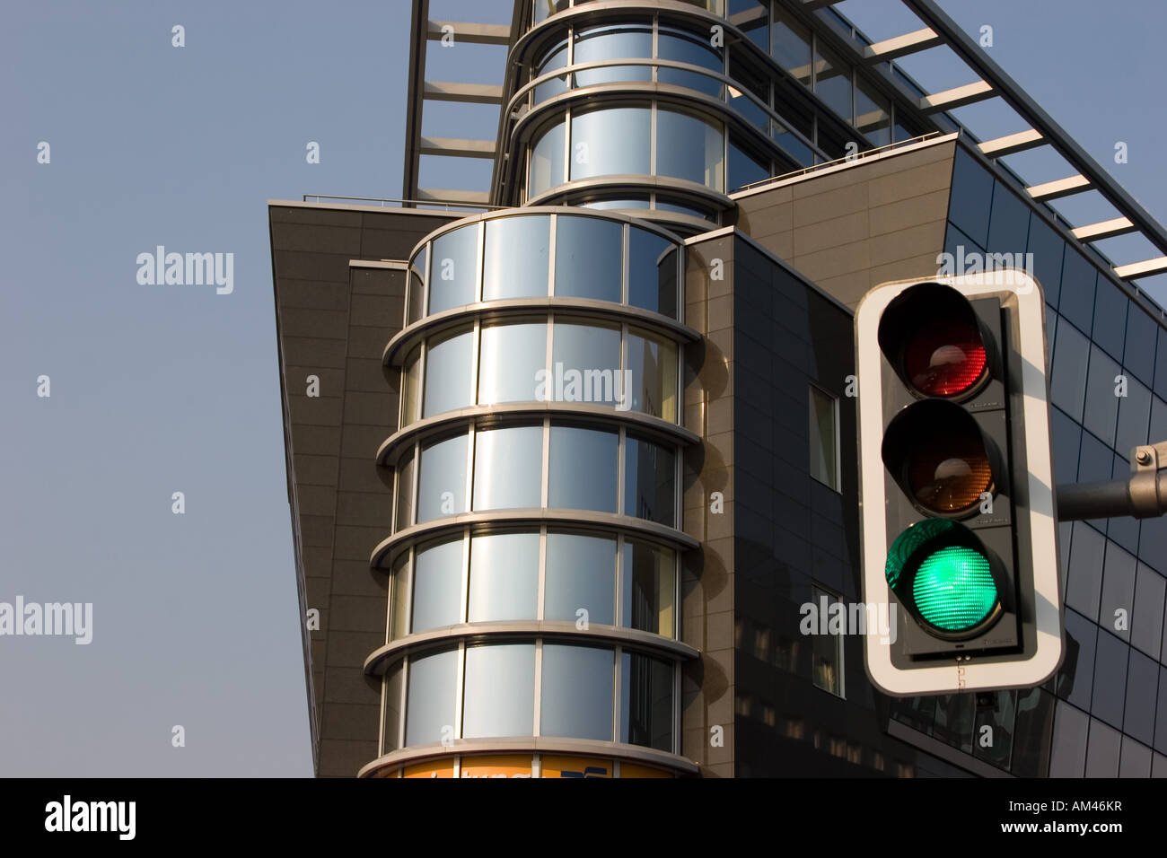 Europe, Germany, Berlin, Green traffic light and architectural detail ...
