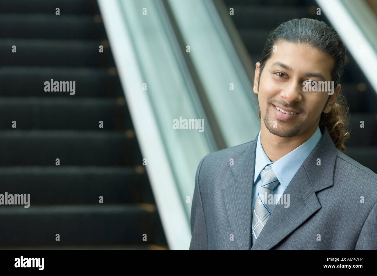 Asian businessman and smile and airport hi-res stock photography and ...