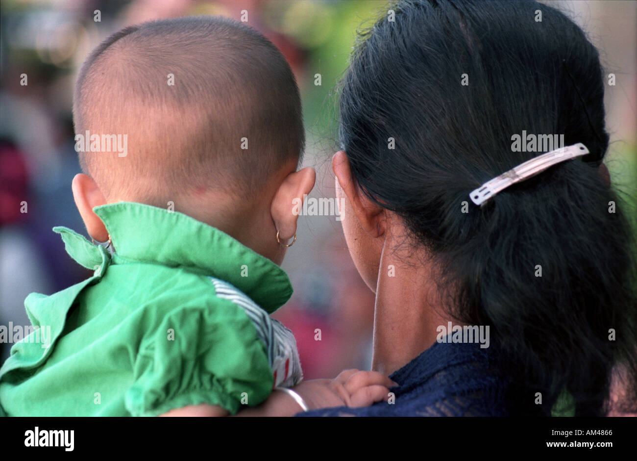A baby and her mother in Bali Indonesia Stock Photo - Alamy