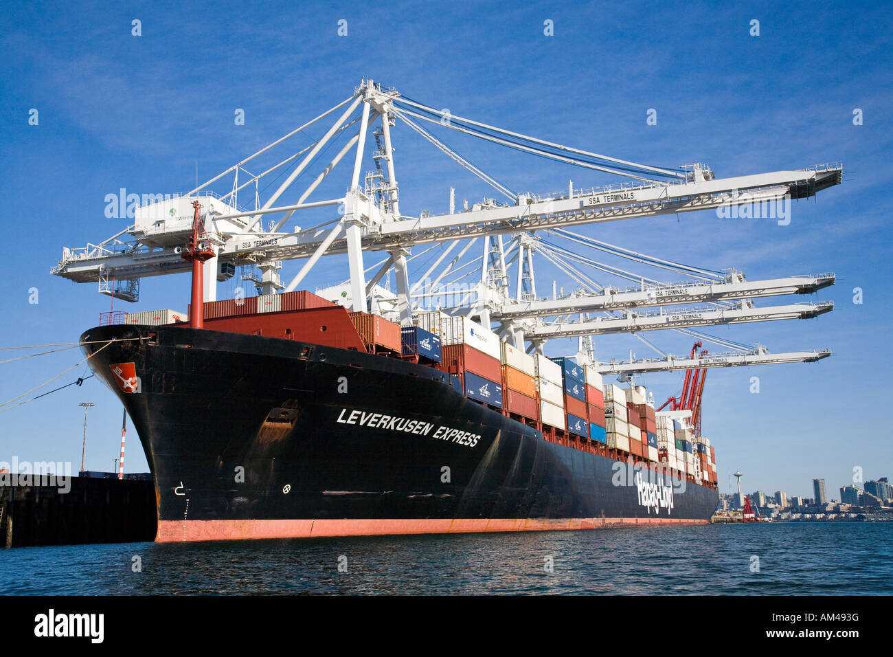 Cranes and dock at port of Seattle with container ship Stock Photo - Alamy